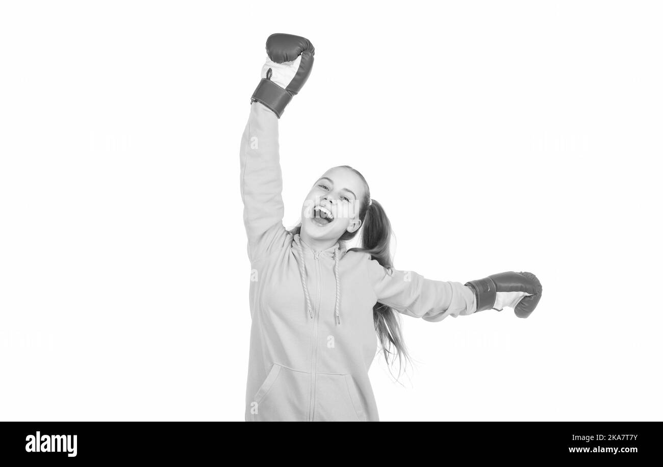 happy kid celebrate victory. winner of fight. teen girl in boxing ...