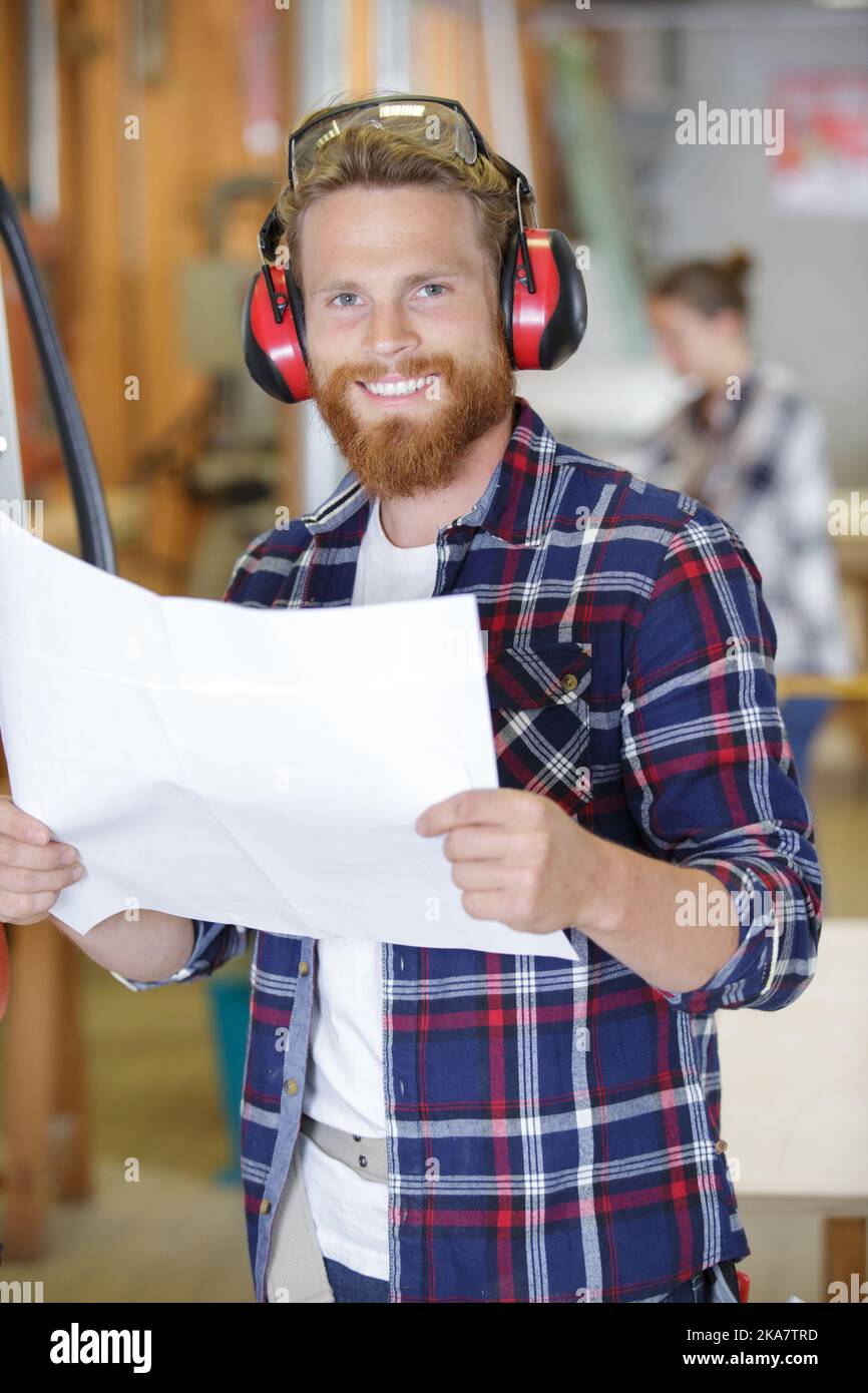 attractive and confident constructor carpenter Stock Photo - Alamy