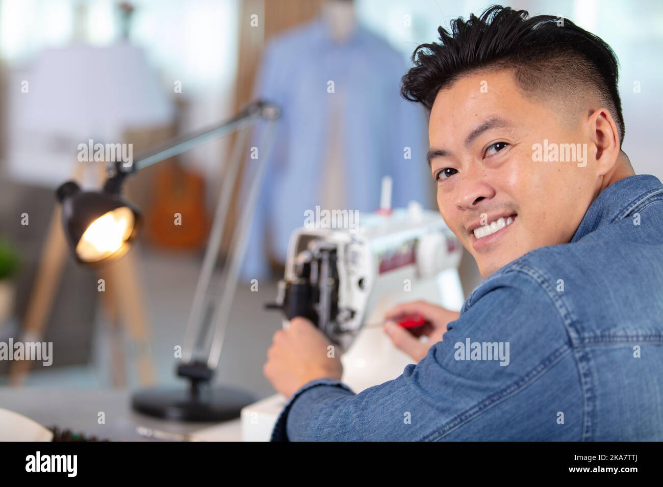 Male tailor sewing in hi-res stock photography and images - Alamy