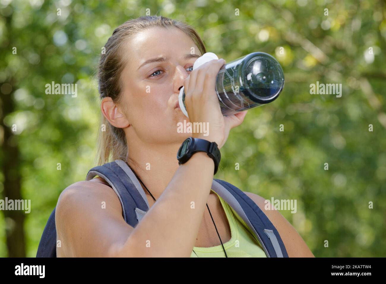 female hiker pausing for a drink Stock Photo - Alamy