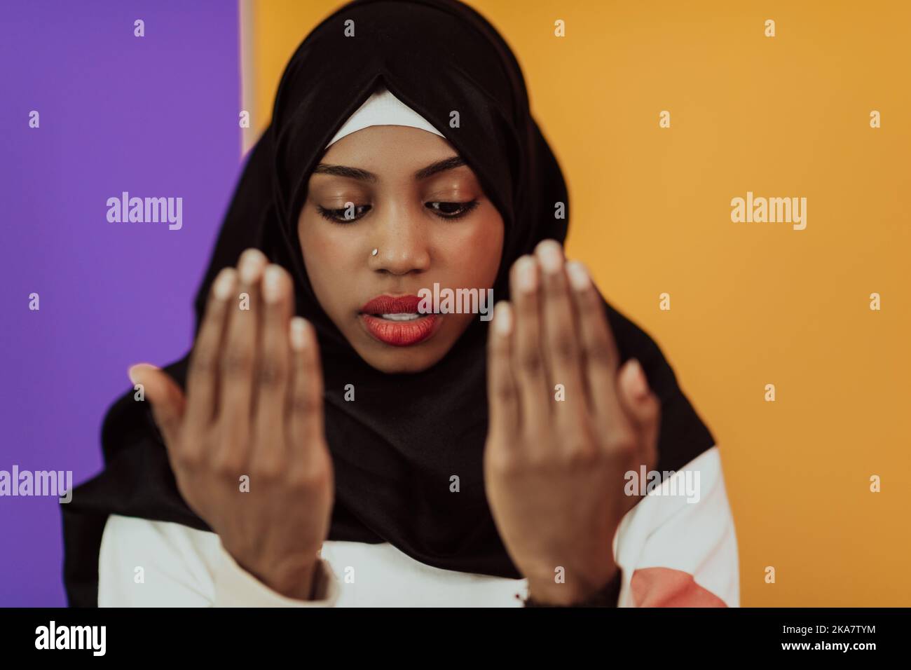 African muslim woman wearing hijab and traditional muslim clothes ...