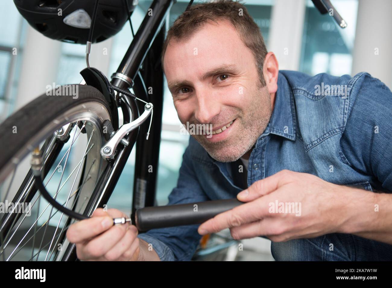 Inflating the tyre hi-res stock photography and images - Alamy