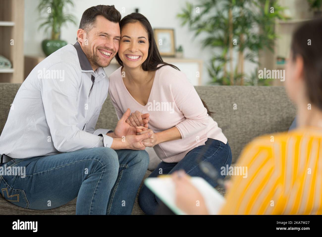 Couple holding hands during therapy hi-res stock photography and images ...