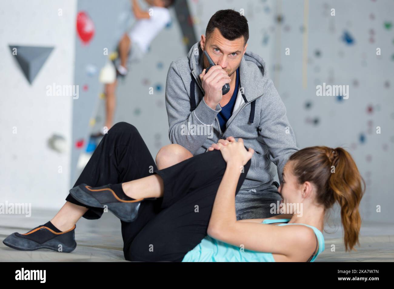 woman fell of wall while climbing Stock Photo - Alamy