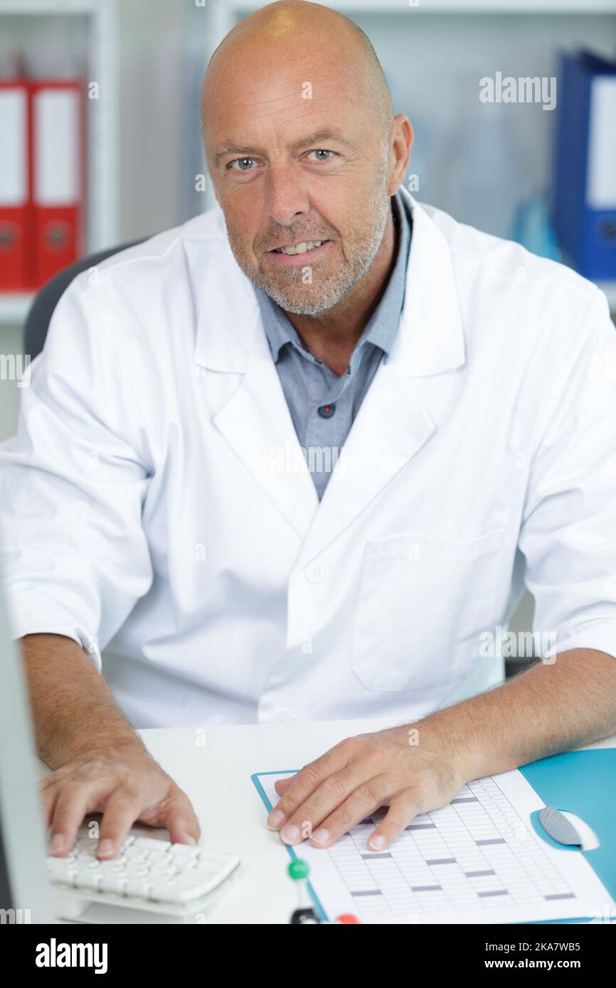 Mature male researcher in hi-res stock photography and images - Alamy