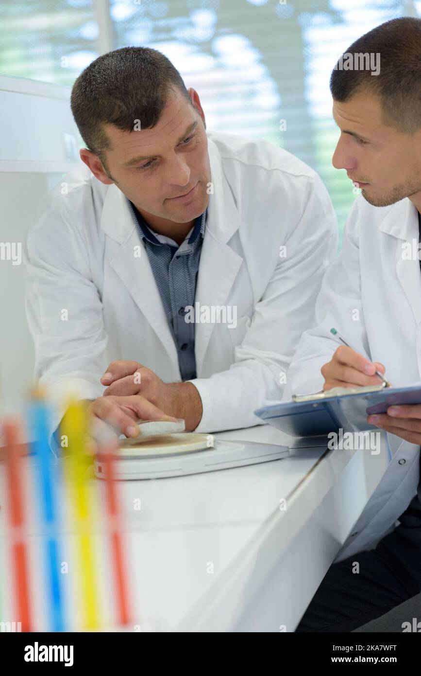 two lab doctor testing food products Stock Photo - Alamy