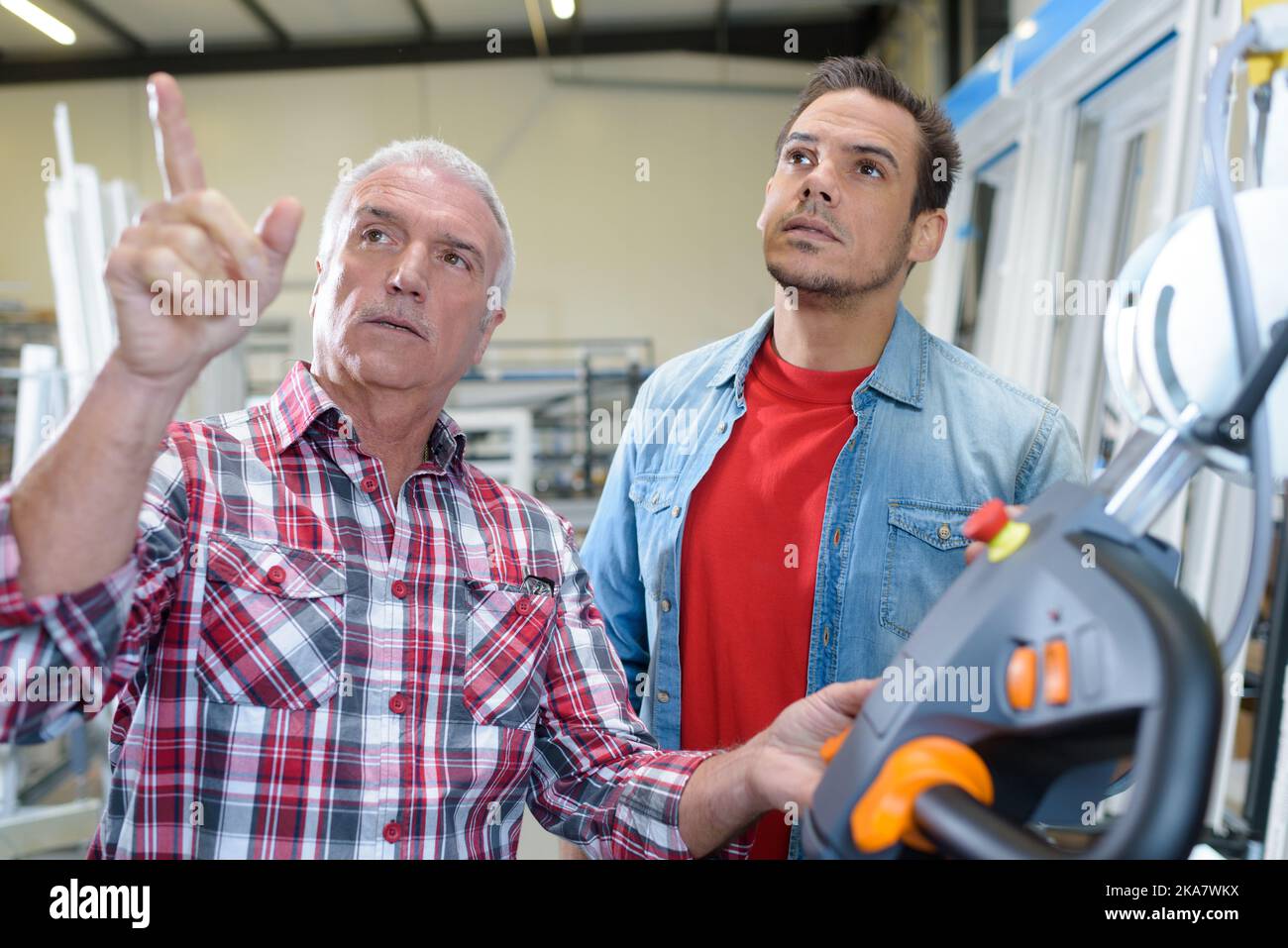 two men in window manufacturing factory Stock Photo - Alamy