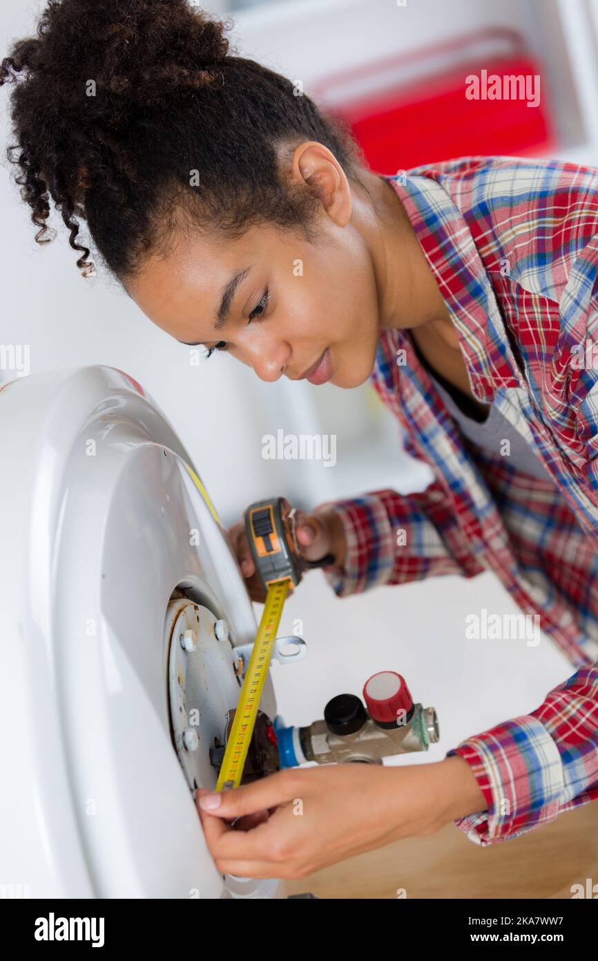 Female plumber model hi-res stock photography and images - Alamy