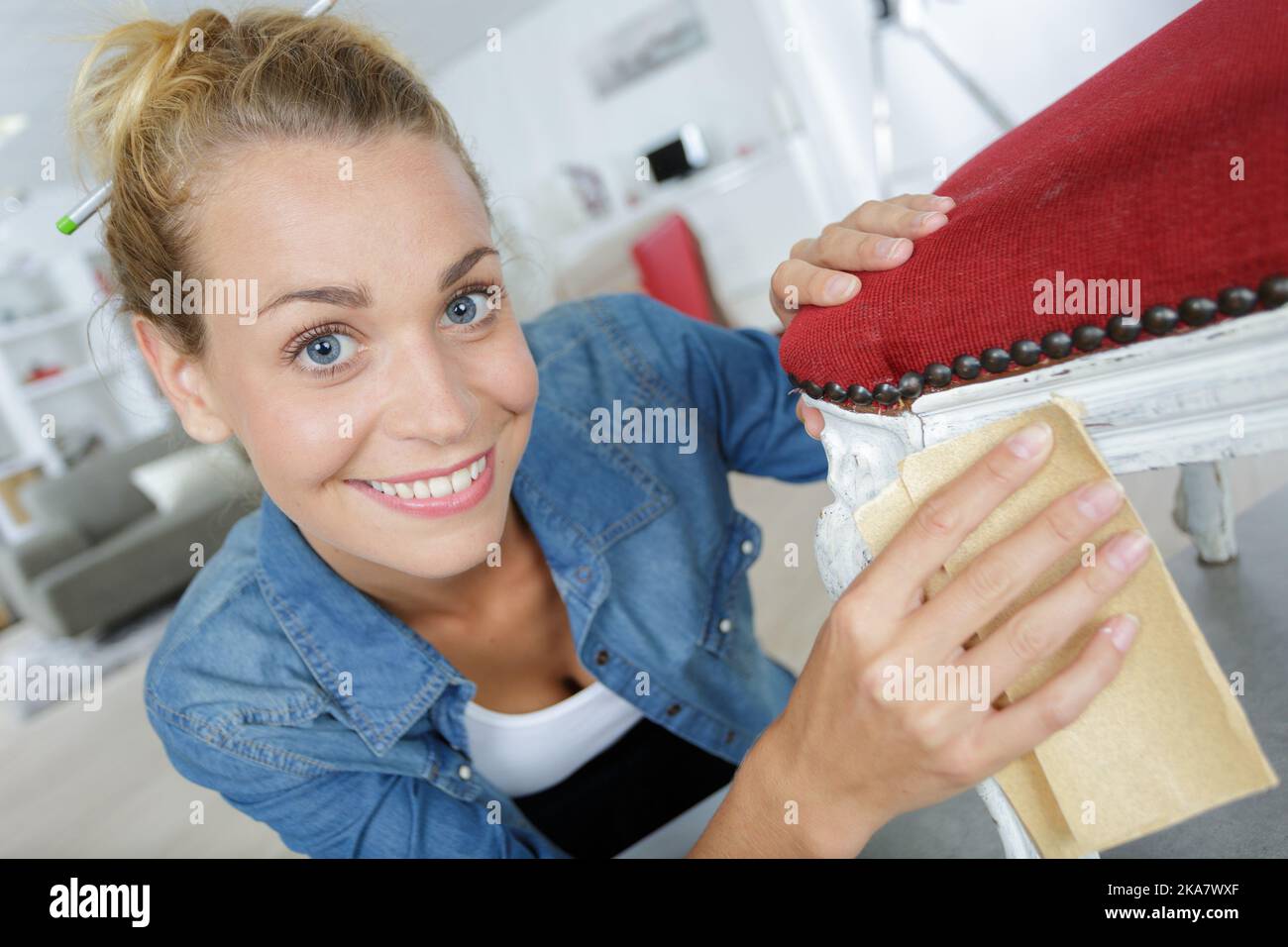 woman sanding a chair in the workshop Stock Photo - Alamy