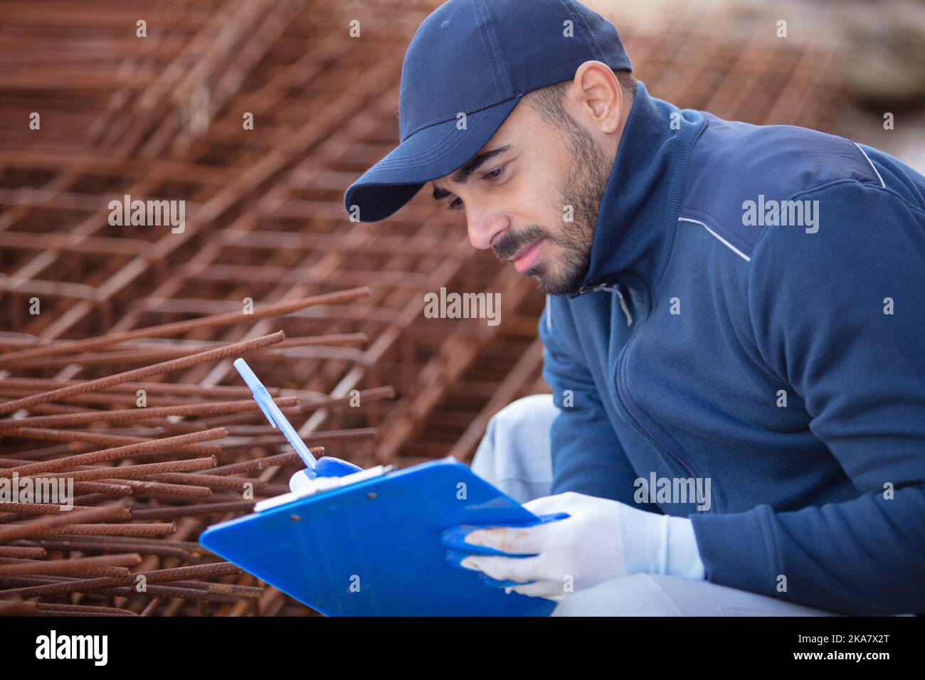 Construction holding rebar construction site hi-res stock photography ...
