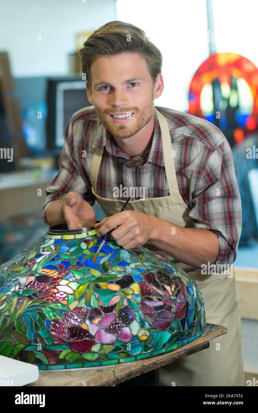 a happy murano glass worker Stock Photo - Alamy