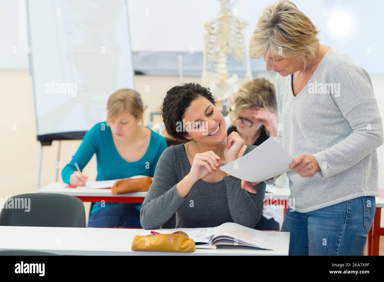 Distributing papers hi-res stock photography and images - Alamy