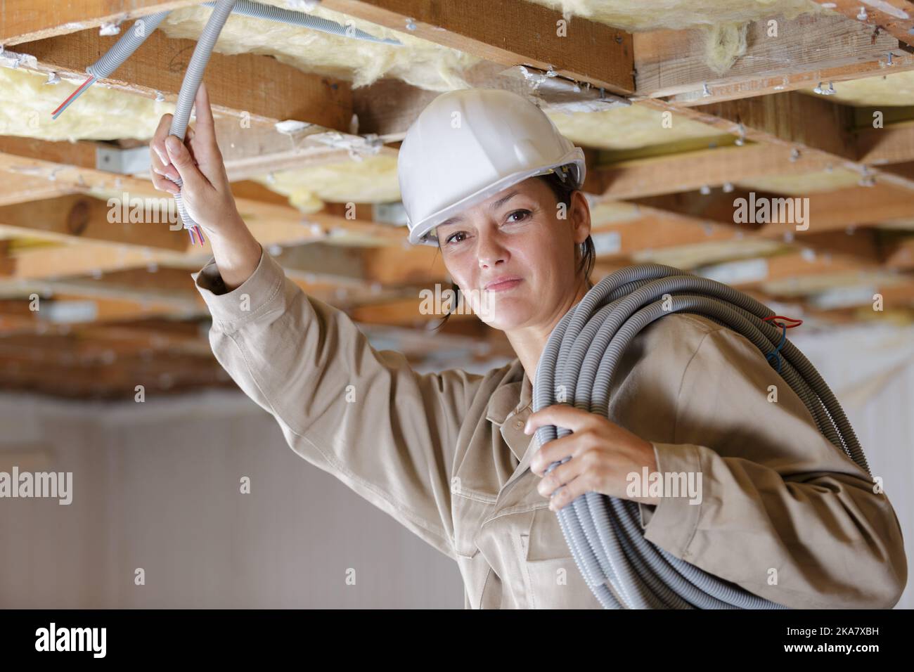female engineer checking cables in a construction site Stock Photo - Alamy