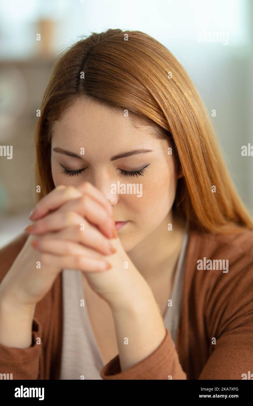 religious praying woman at home Stock Photo - Alamy