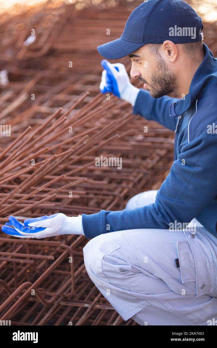 a builder works on the construction of concrete structures Stock Photo ...