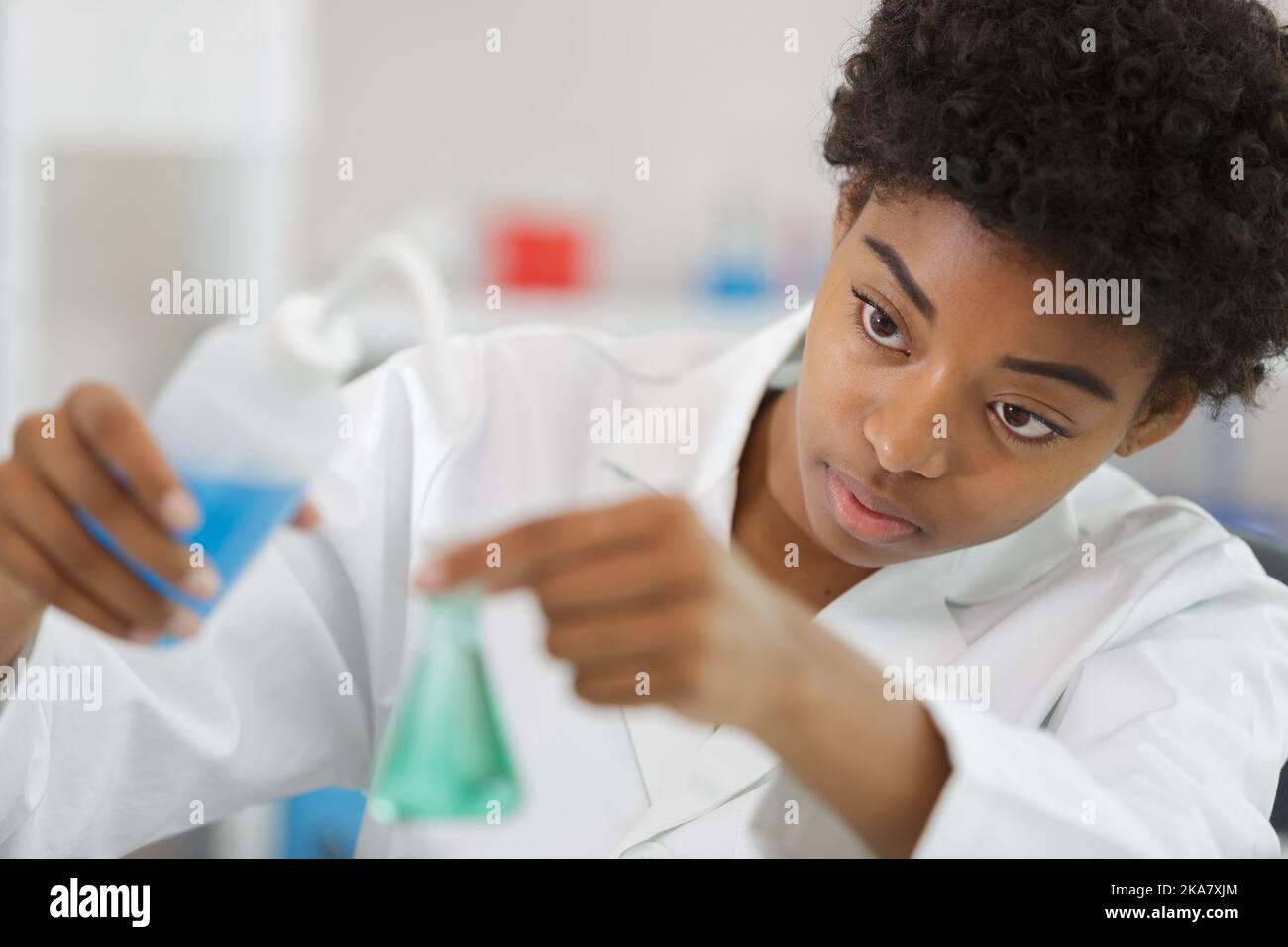 black female chemist student conducting research Stock Photo - Alamy