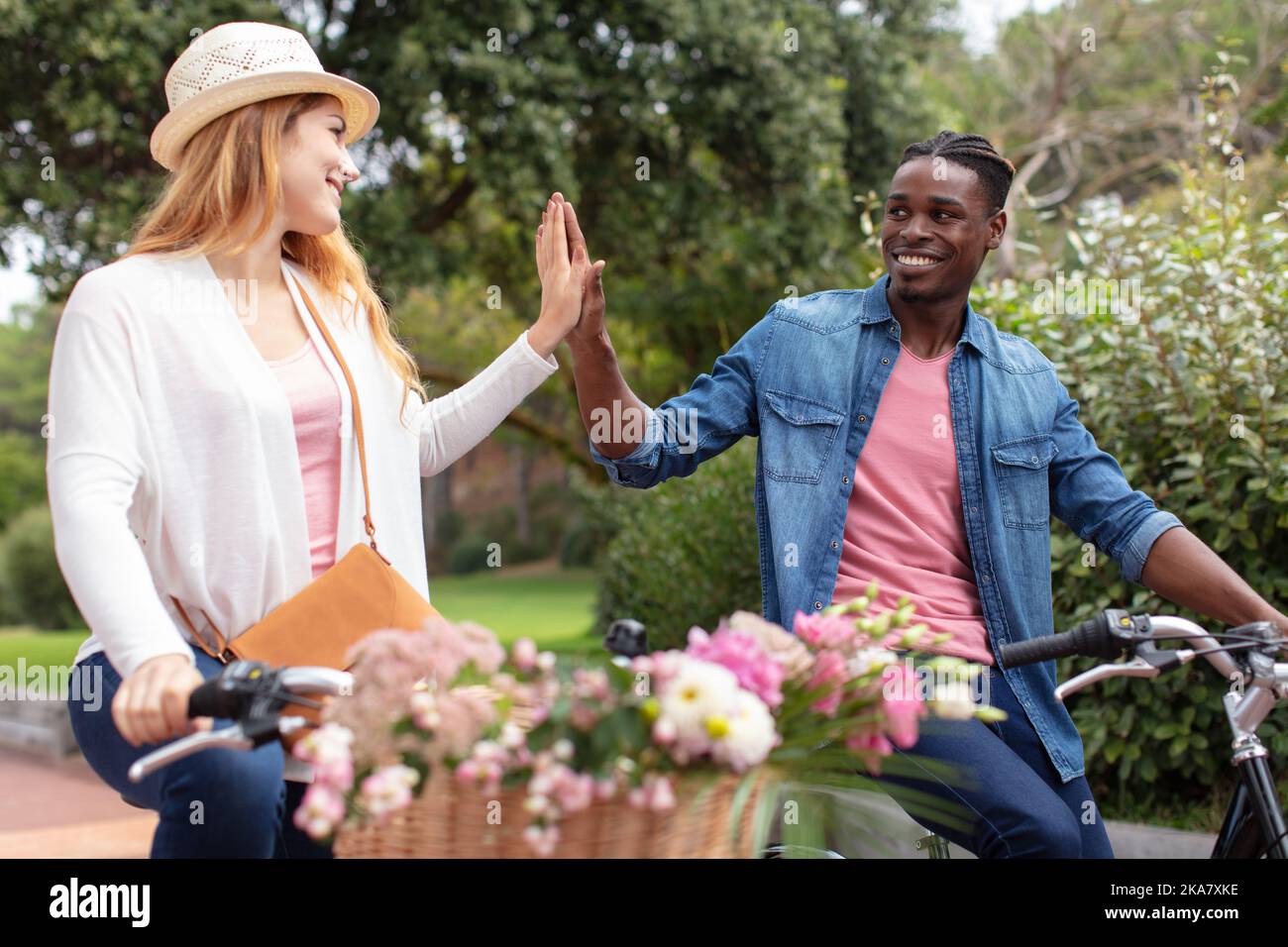 young couple going for a bike ride Stock Photo - Alamy