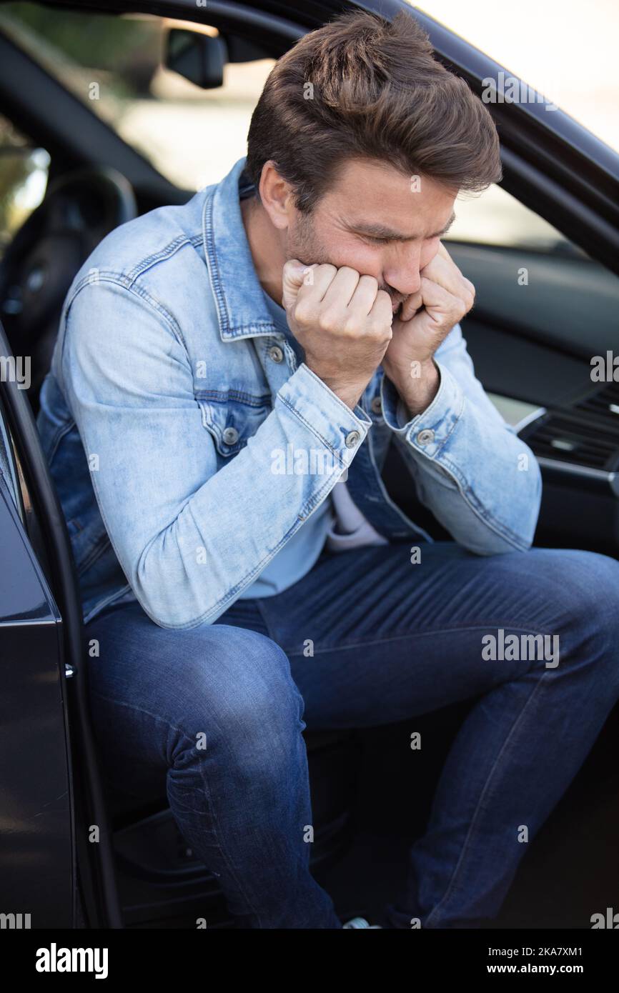 portrait of sad pensive man driver Stock Photo - Alamy