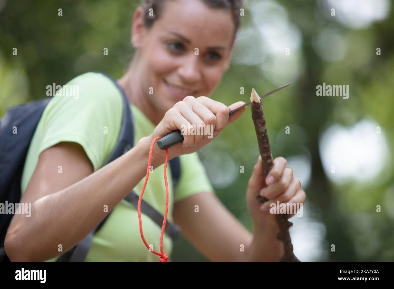 Woman looking stick work hi-res stock photography and images - Alamy
