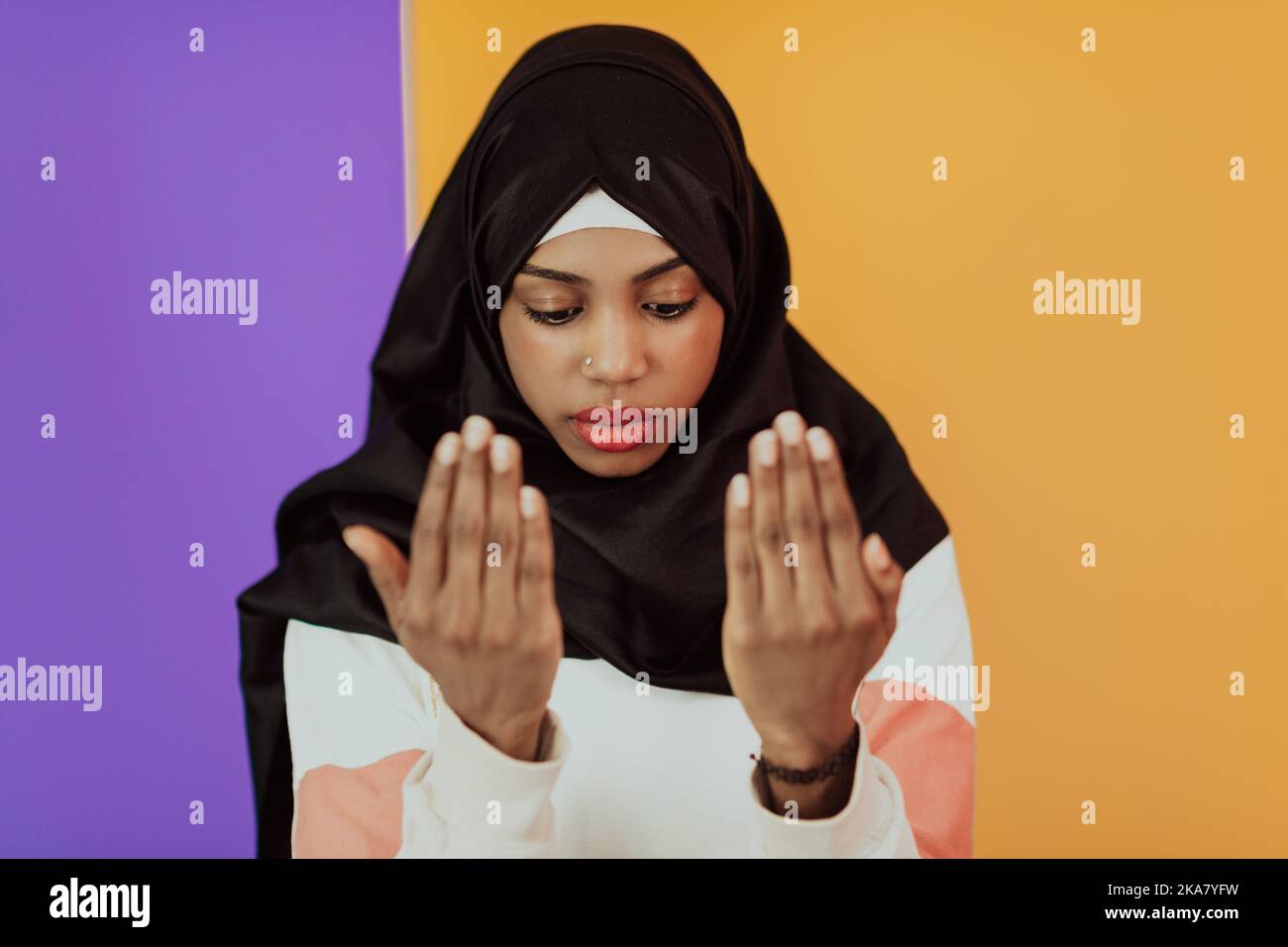 African muslim woman wearing hijab and traditional muslim clothes ...