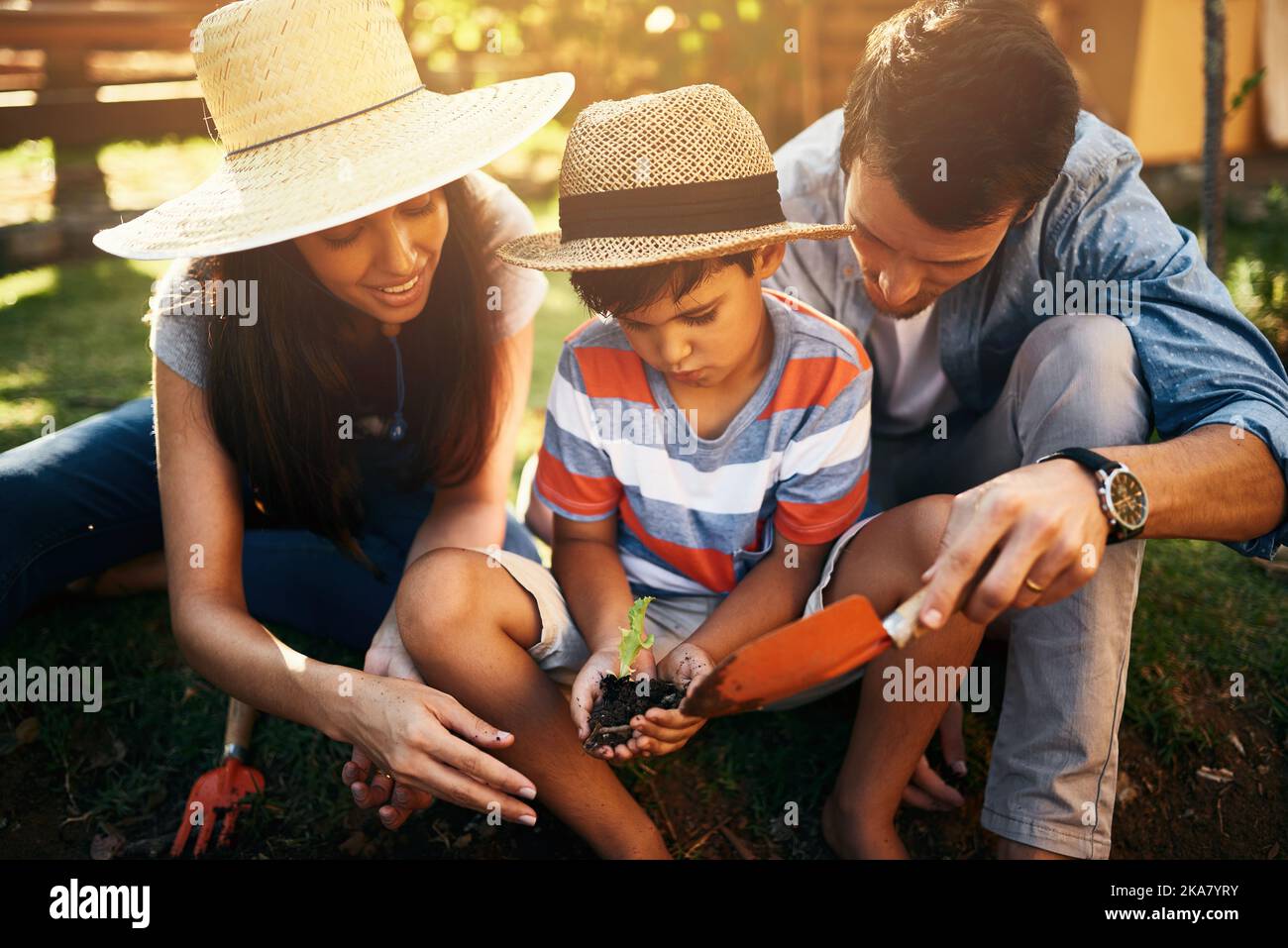 Teaching their son about the immeasurable value of nature. a family ...