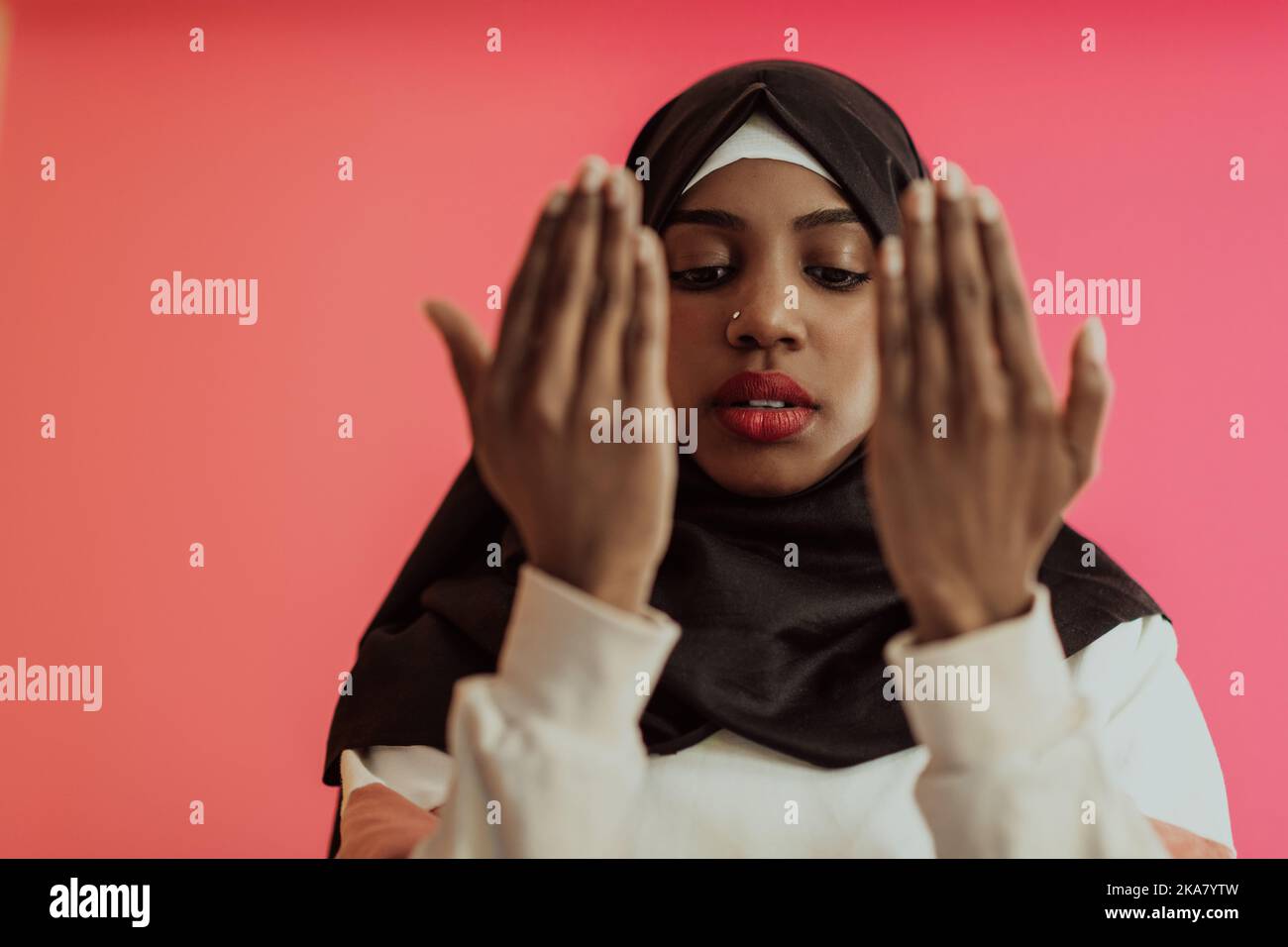African muslim woman wearing hijab and traditional muslim clothes ...
