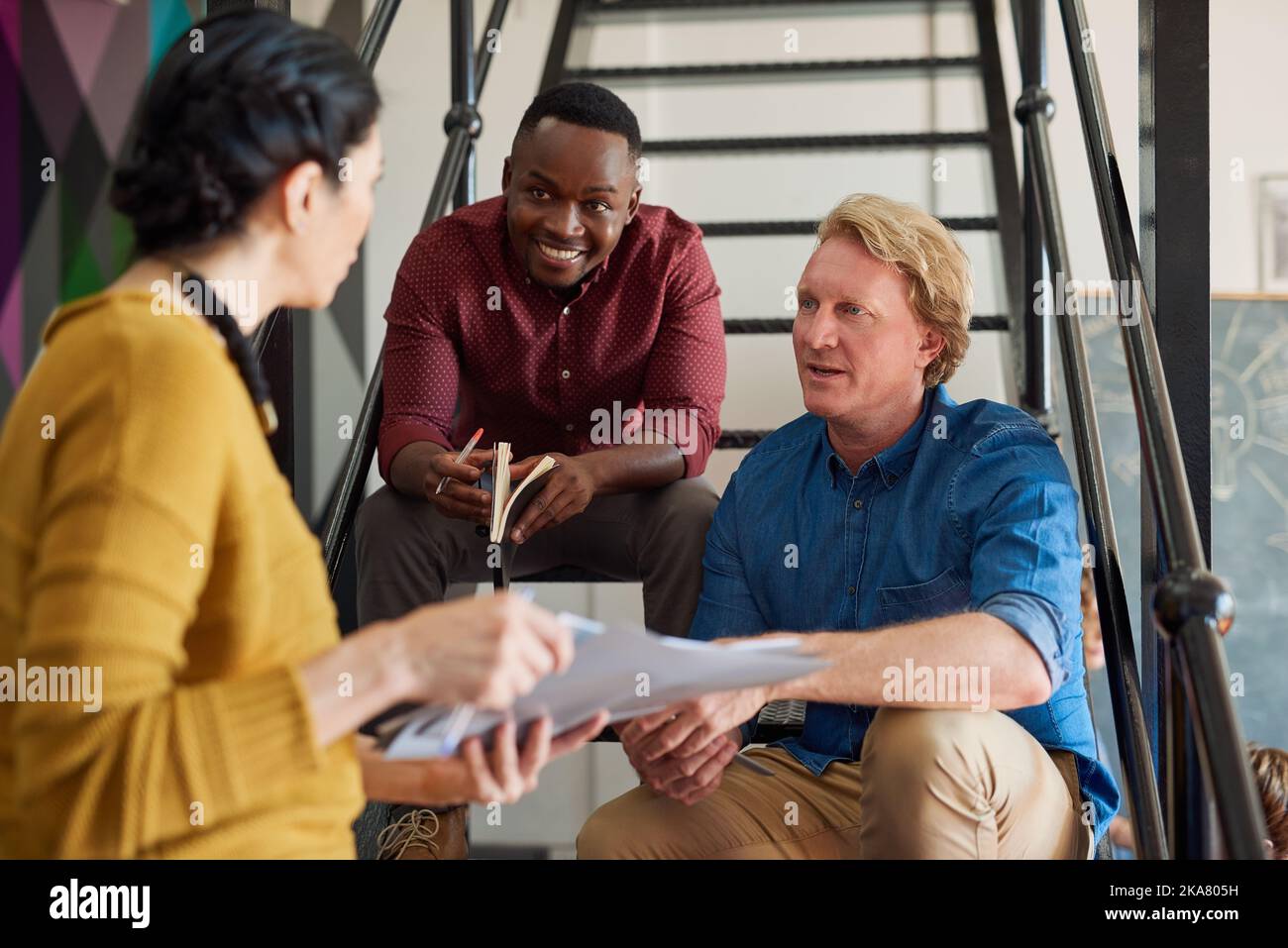 Solving problems is what were paid to do. a group of creative workers ...