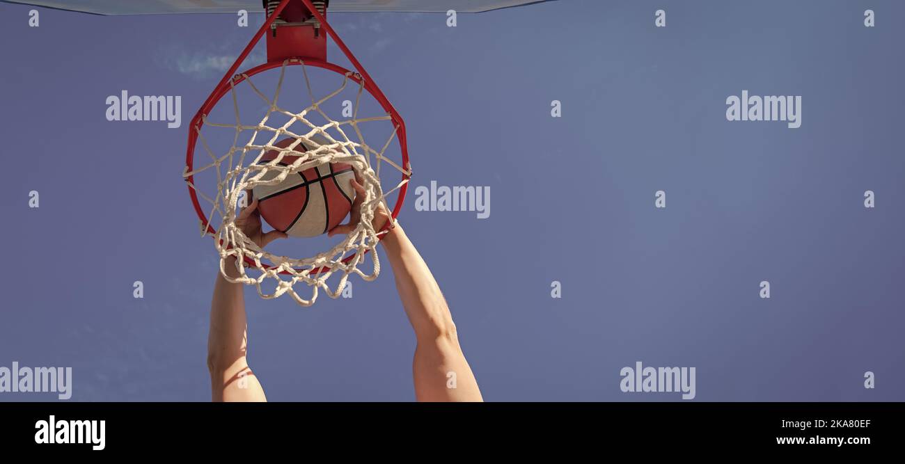 happy man with basketball ball on court. professional basketball player ...