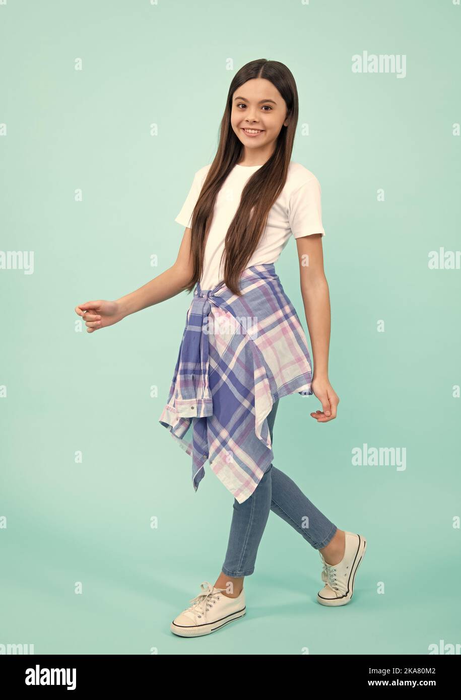 Full length of pretty cheerful teenager girl having fun good mood and ...