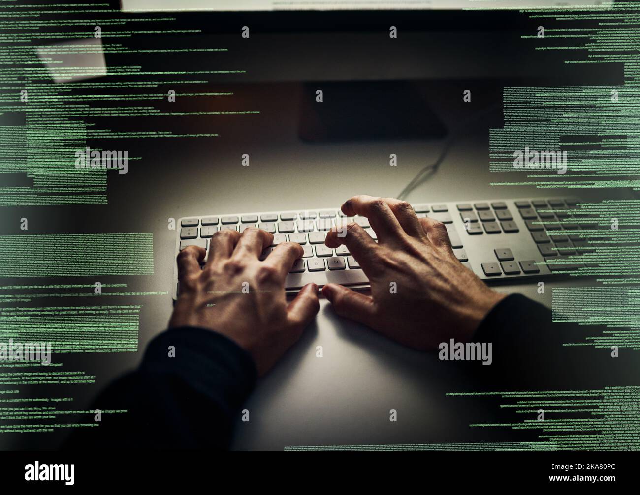 Busy cracking codes in the dark. an unrecognizable hacker cracking a ...