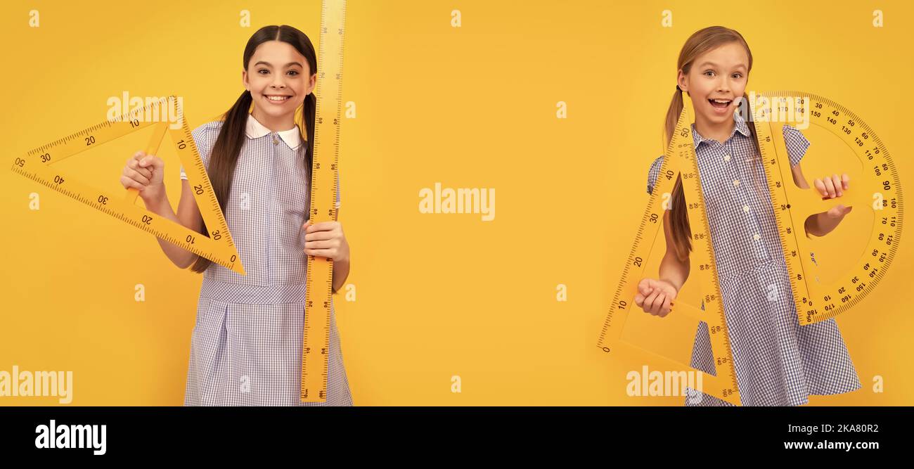 School girls friends. Happy school age children hold geometric tools ...