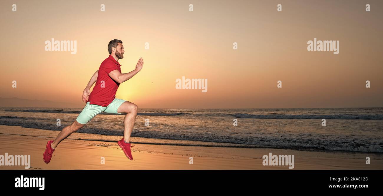 sportsman sprinter running on sunrise summer beach at ocean, copy space ...