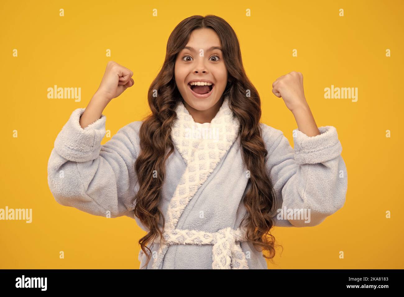 Amazed teen girl. Excited expression, cheerful and glad. Joy, victory, celebration and ...