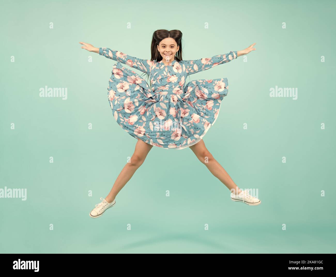Excited teenager, amazed and cheerful emotions. Teenager girl jumping ...