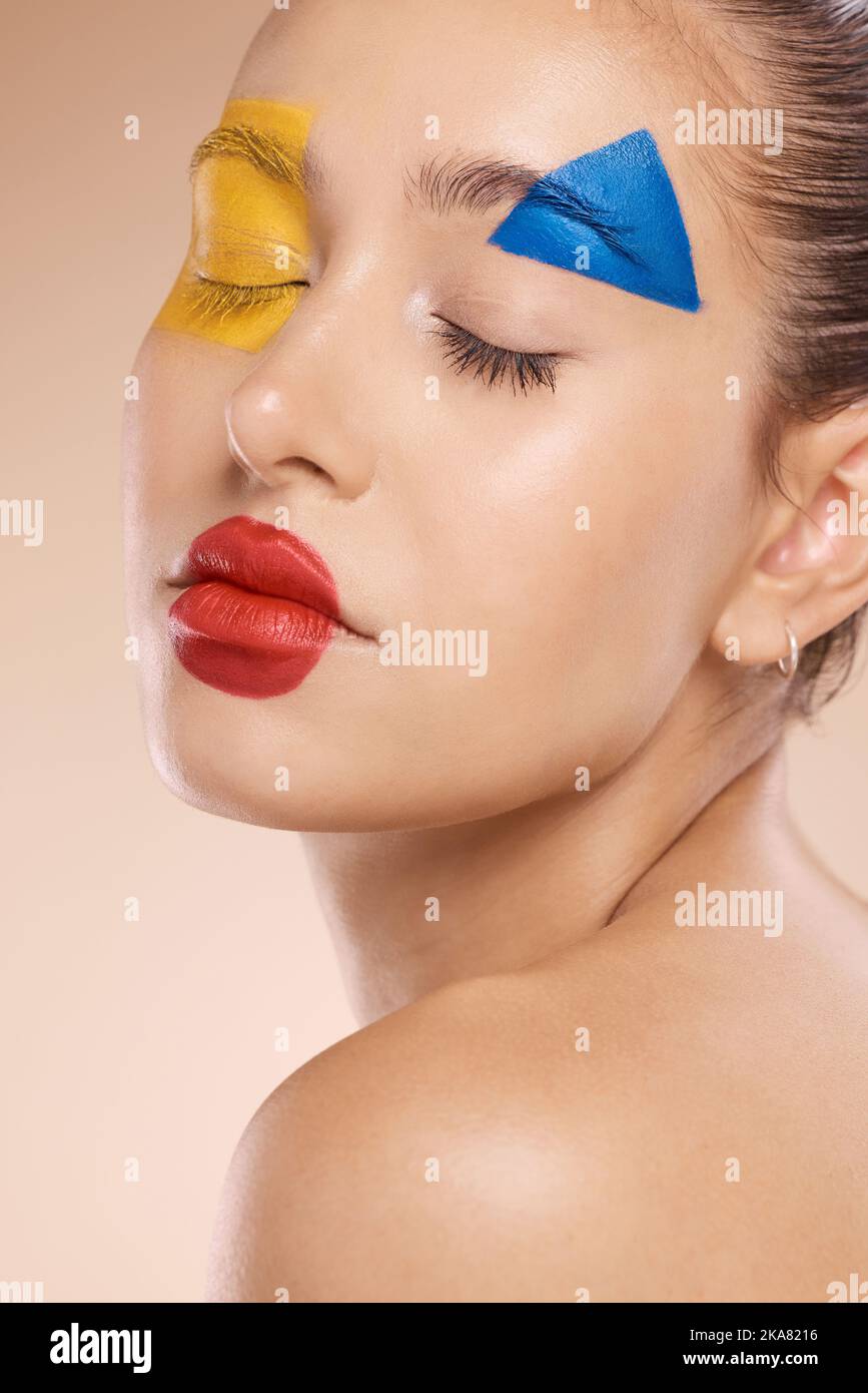 Portrait of woman creative makeup on face, beauty and self expression ...