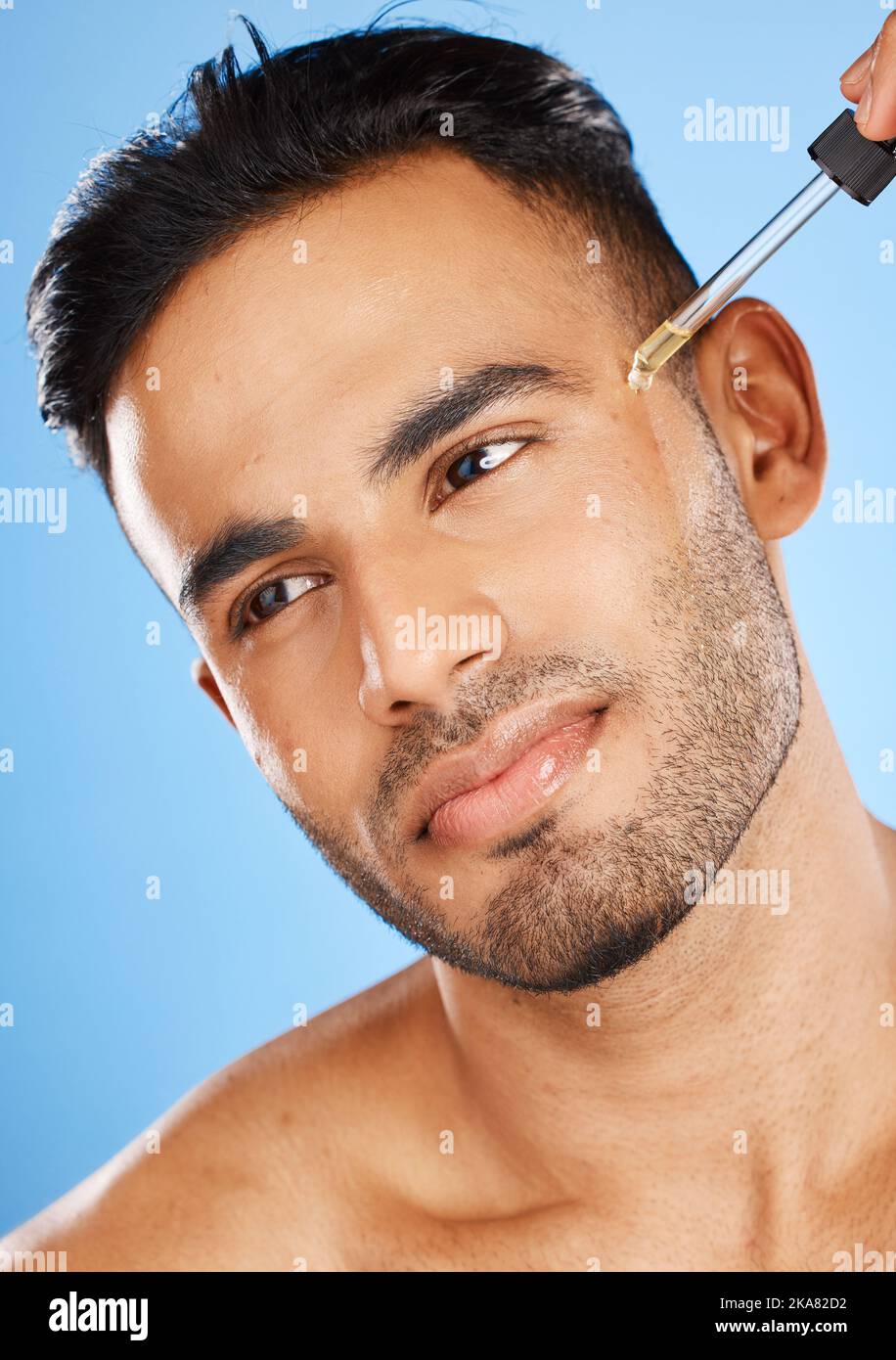 Face serum, model and skincare of a man from Spain with perfect skin ...