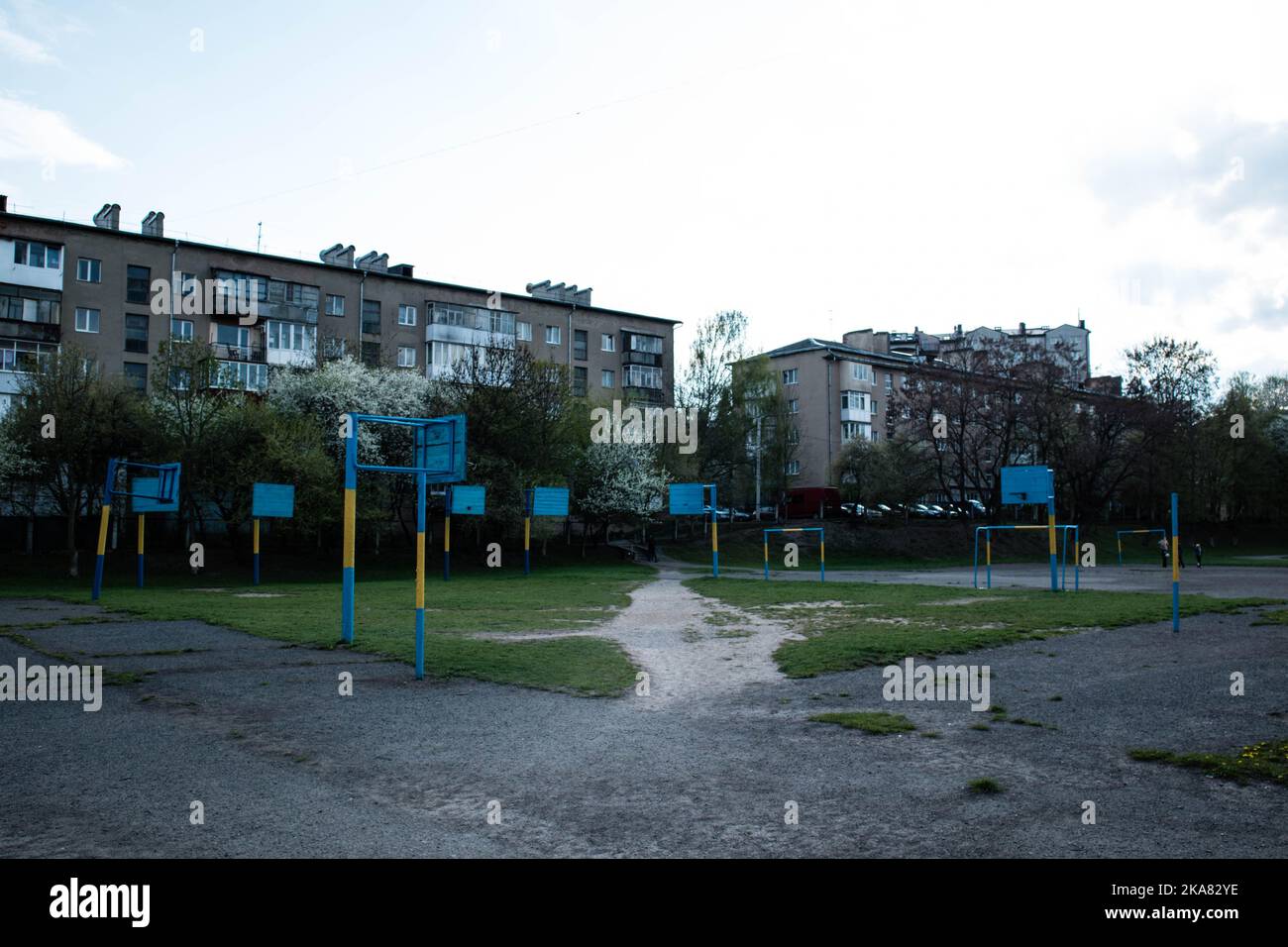 A playground in a yard between soviet era buildings Stock Photo - Alamy