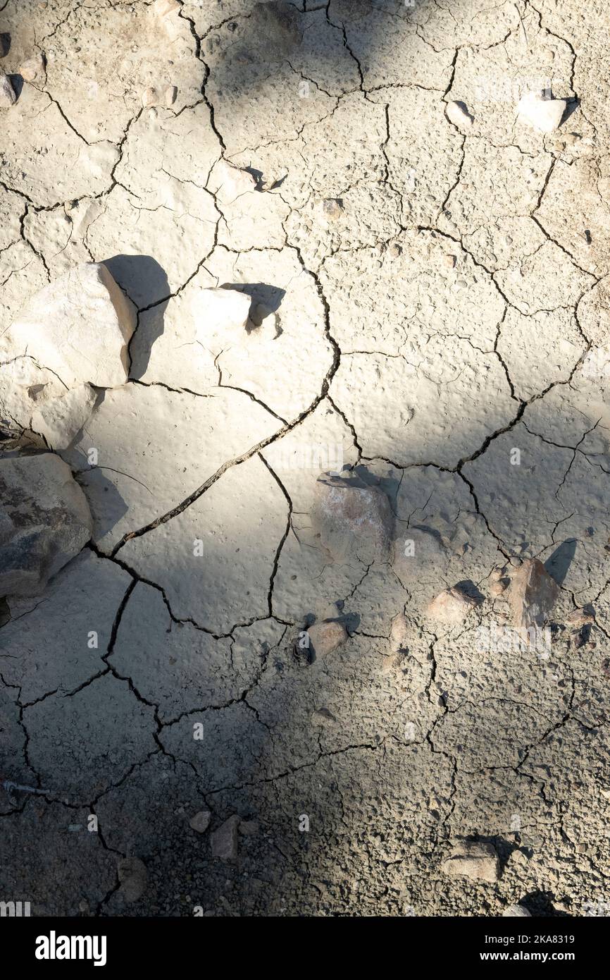 Texture dry cracked soil, background pattern of drought lack of water ...