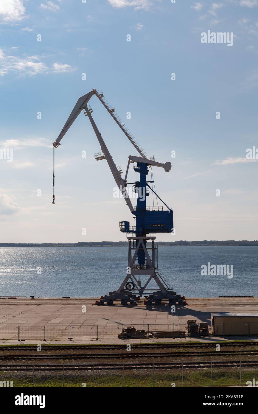 Lifting harbor crane in the cargo seaport Stock Photo - Alamy
