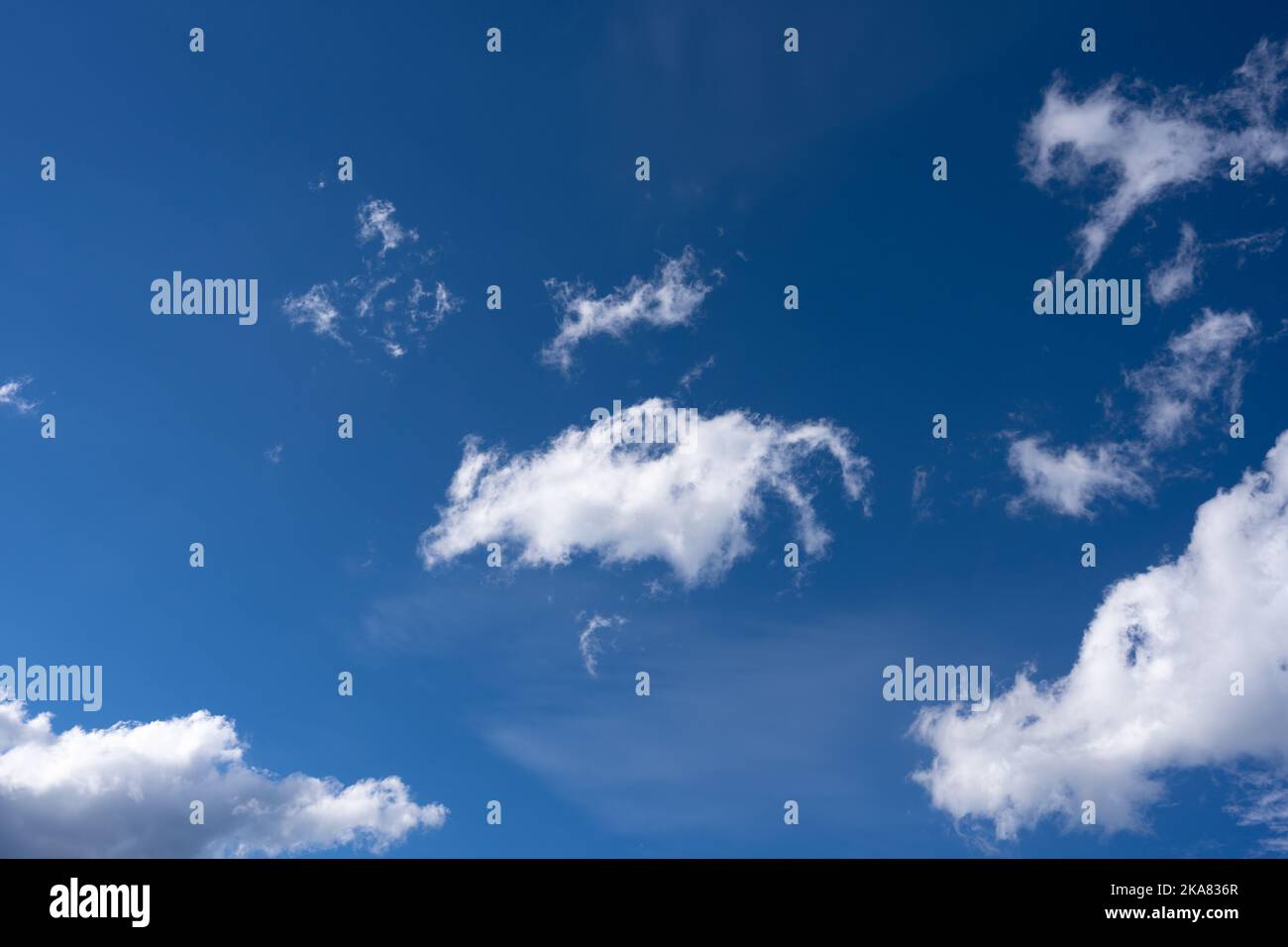A Blue sky background with white clouds Stock Photo - Alamy