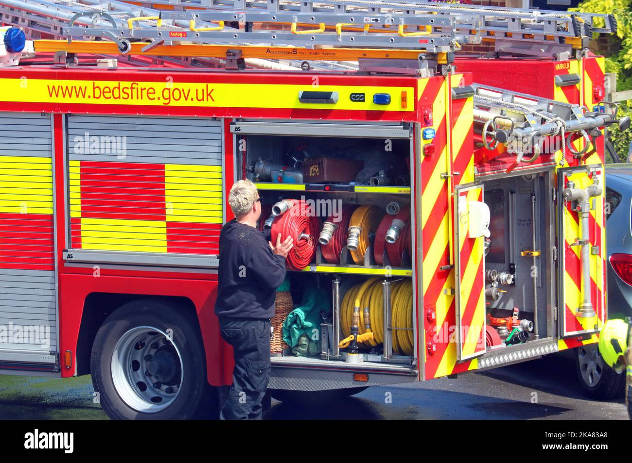 Fire engine attending fire in hi-res stock photography and images - Alamy
