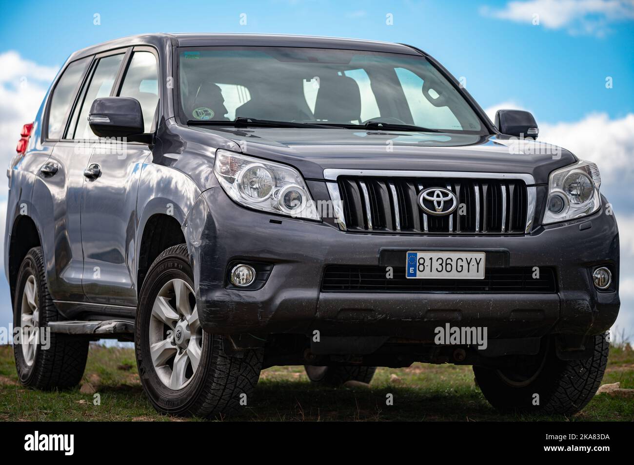 gray modern Toyota Land Cruiser on the mountain, front portrait shot ...