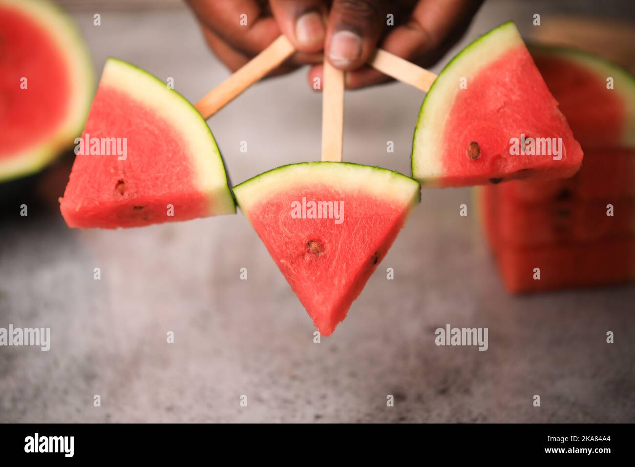 watermelon cut into popsicle shapes Stock Photo - Alamy