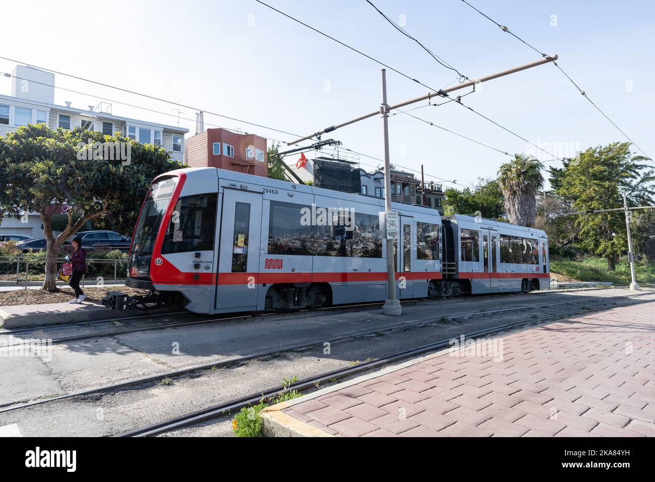 A San Francisco Light Rail train at a stop Stock Photo - Alamy