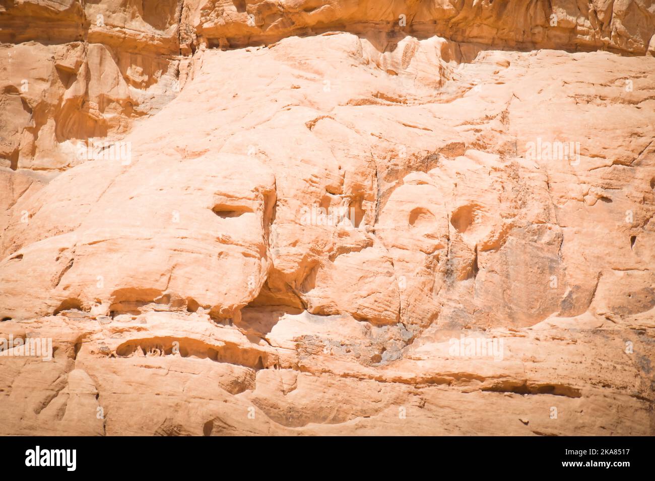 Wadi rum sandstone rock formations with natural symbolic figures on ...