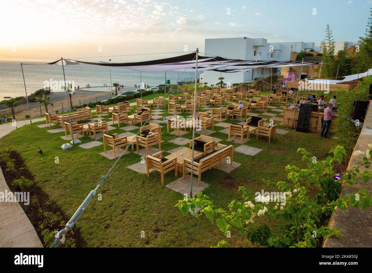 hotel patio terrace with wooden furniture Stock Photo - Alamy