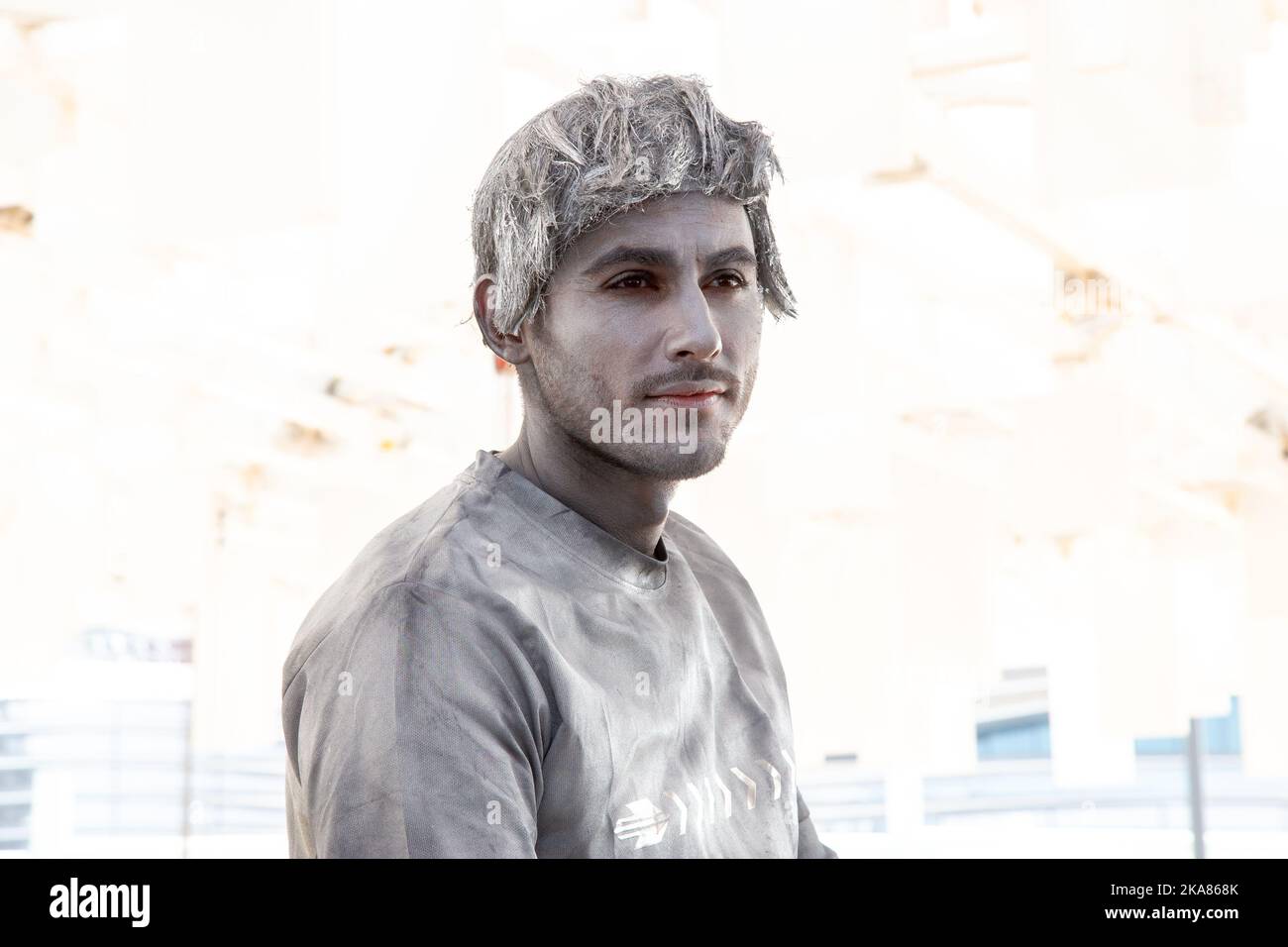 man covered with silver paint Stock Photo - Alamy