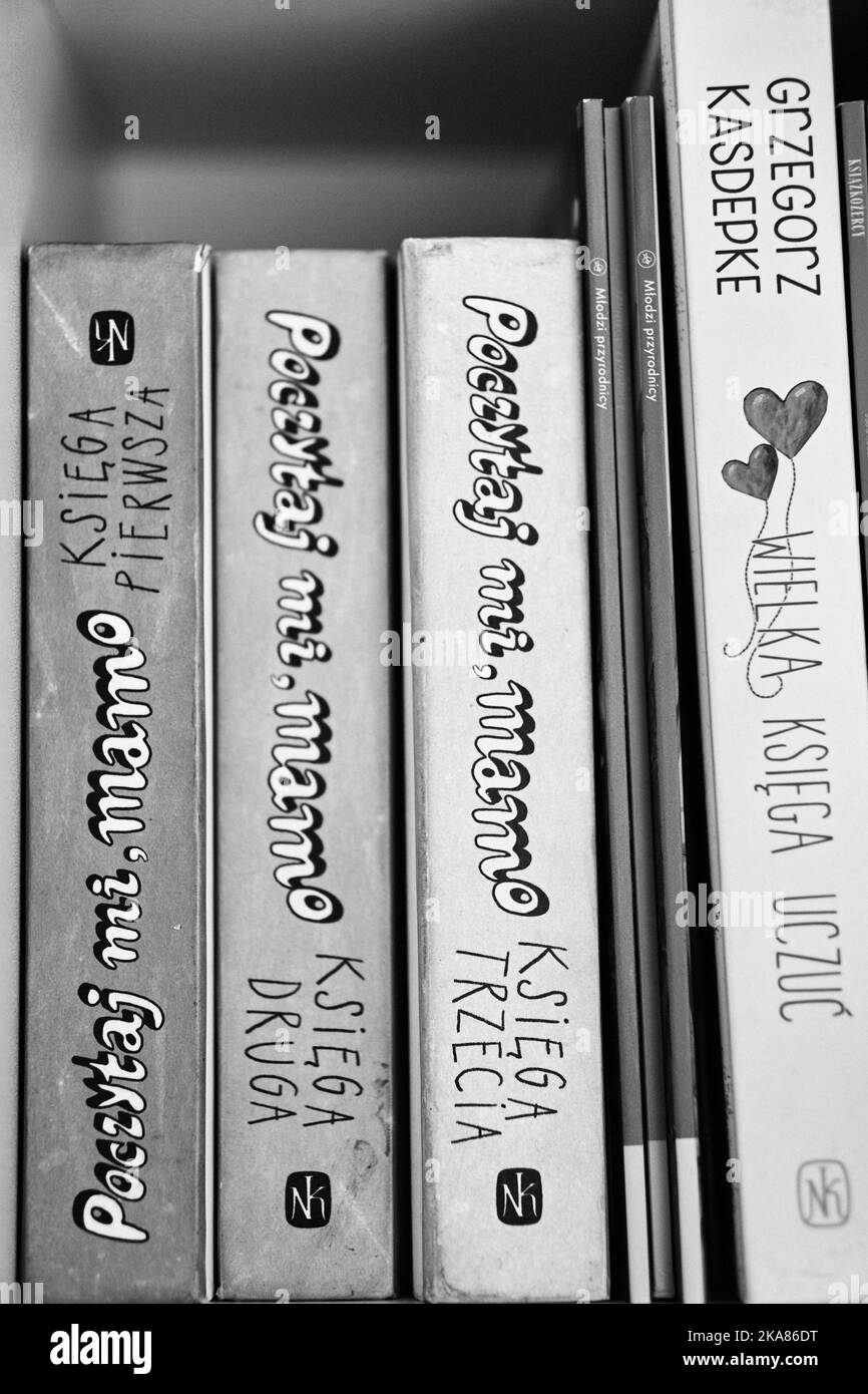 A grayscale close-up of Polish books for children on a shelf Stock ...