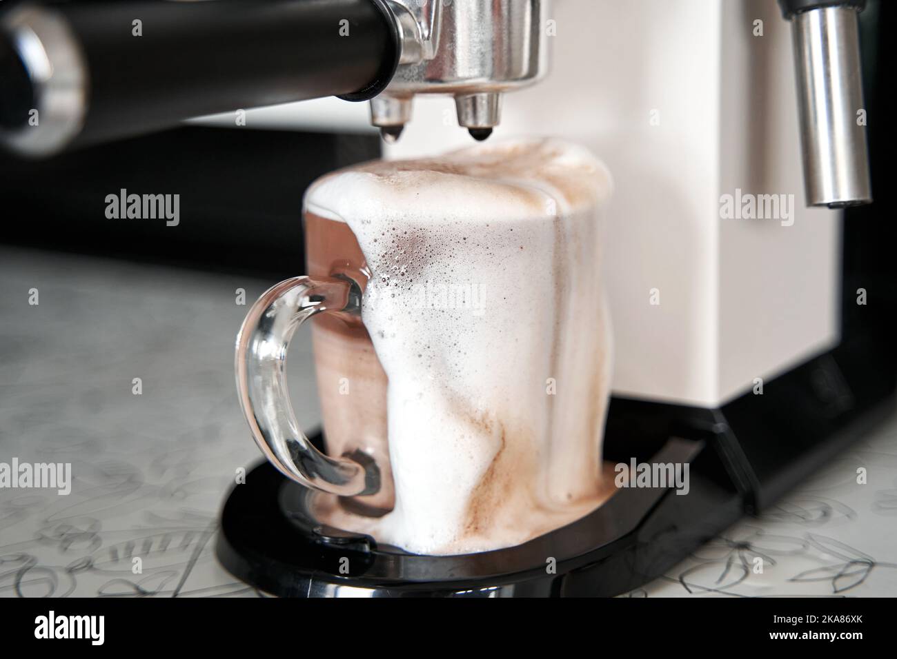 Coffee cup foam overflowing hi-res stock photography and images - Alamy