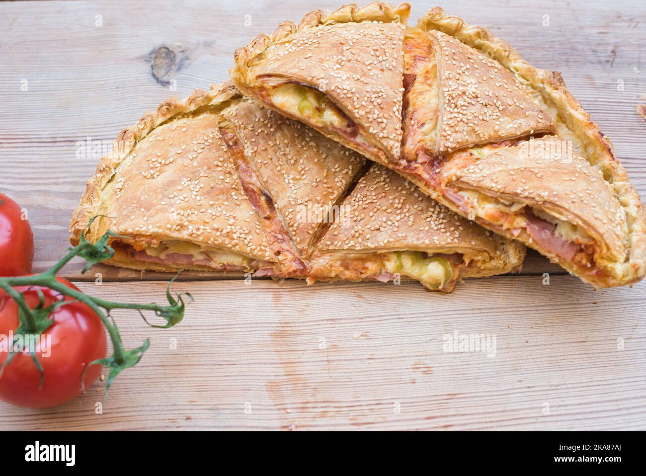 traditional pie, covered pizza baked in wood with wood Stock Photo - Alamy